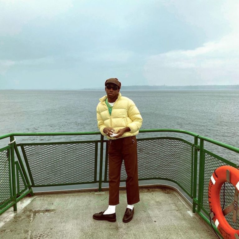 SPOTTED: Tyler, The Creator Catches a Ferry in Yellow Puffer Jacket ...